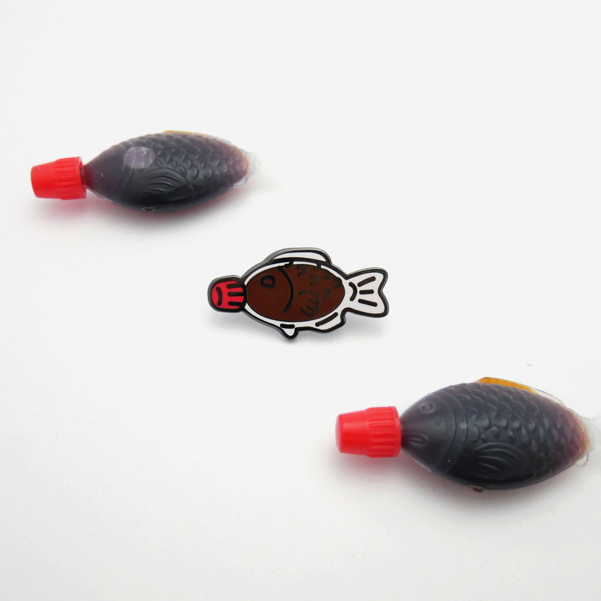 inomnom - Shoyu Fish Bottle Enamel Pin
